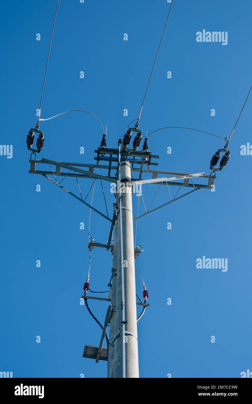 High-voltage power poles against the sky, transmission lines Stock ...