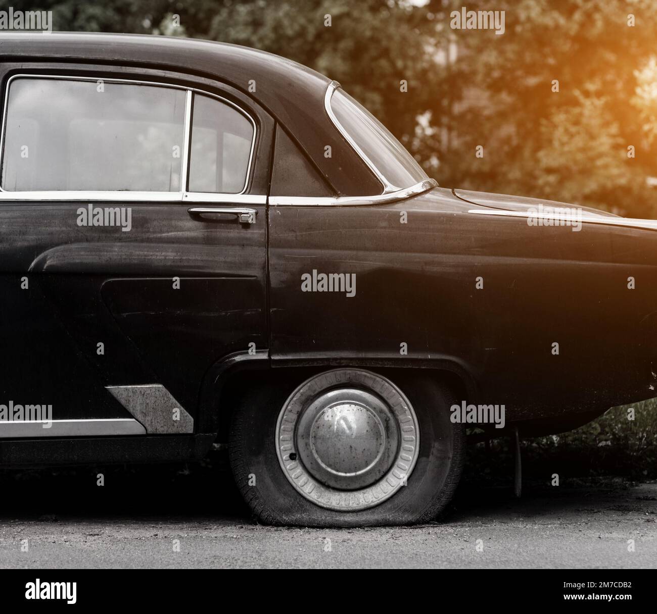 Old black automobile. Vintage transport. Nostalgia Stock Photo - Alamy