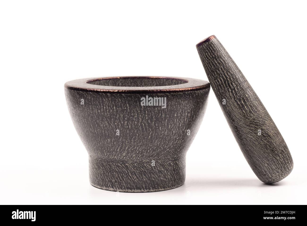 Mortar and Pestle isolated on white background.mortar is a tool for ...