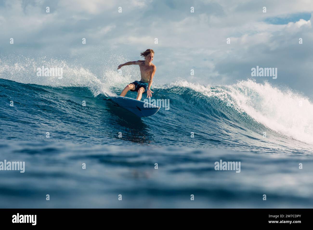 January 4, 2023. Bali, Indonesia. Teenager in tropical ocean during ...