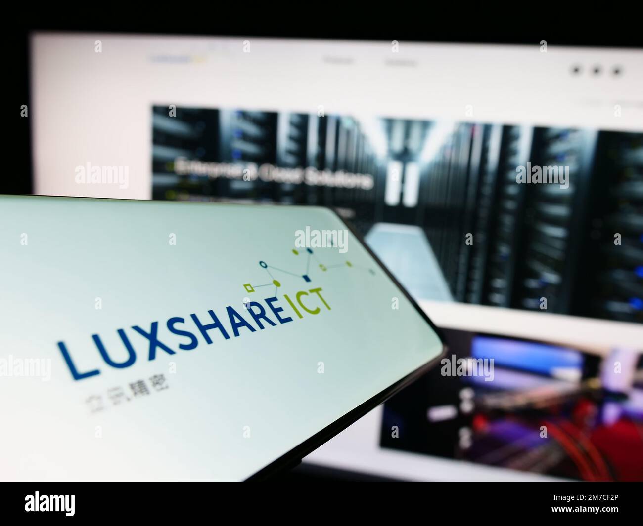 Cellphone with logo of company Luxshare Precision Industry Co. Ltd. on ...