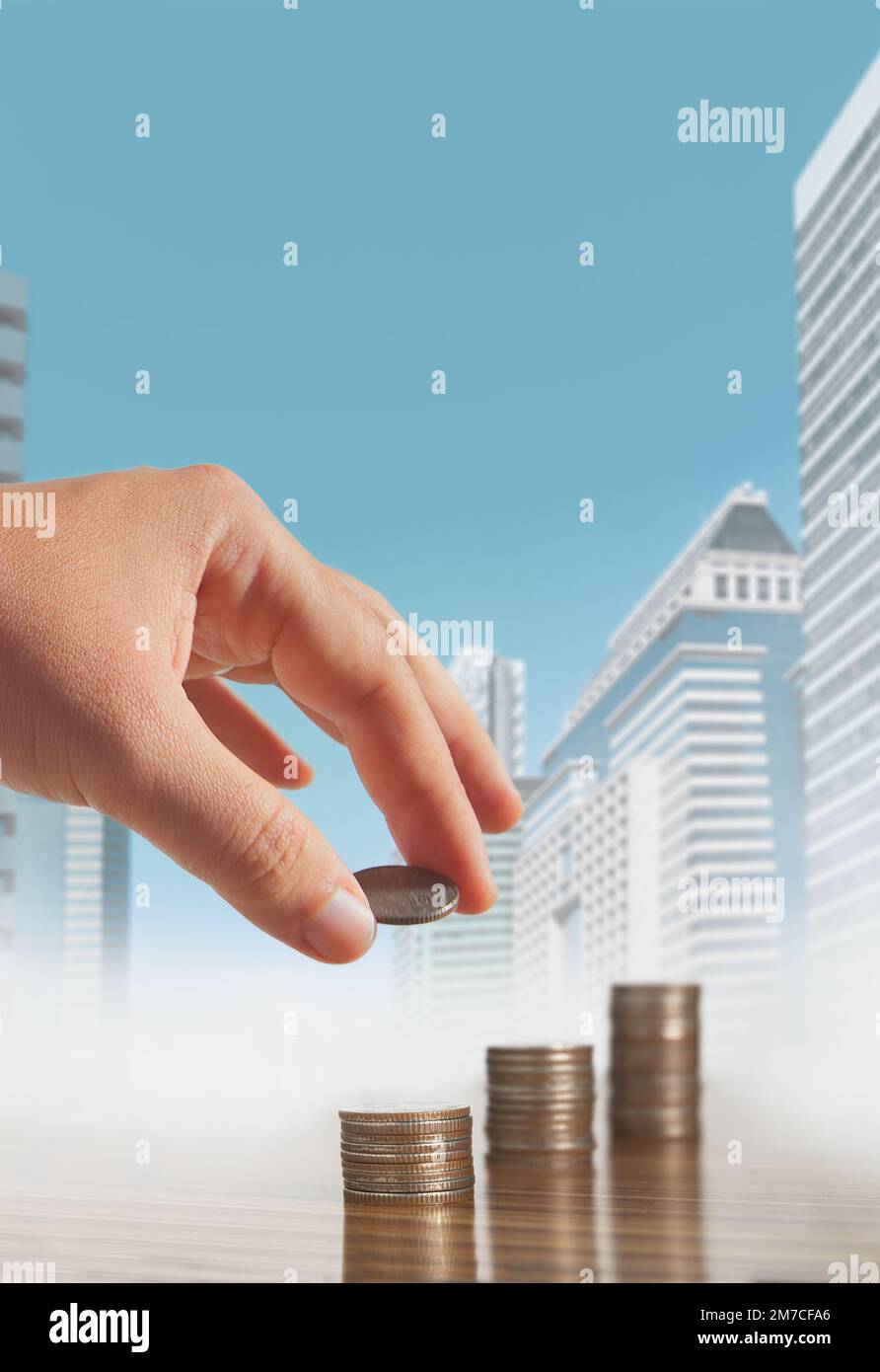 Hand put coin to Growing money Cityscape background, Concept cash ...