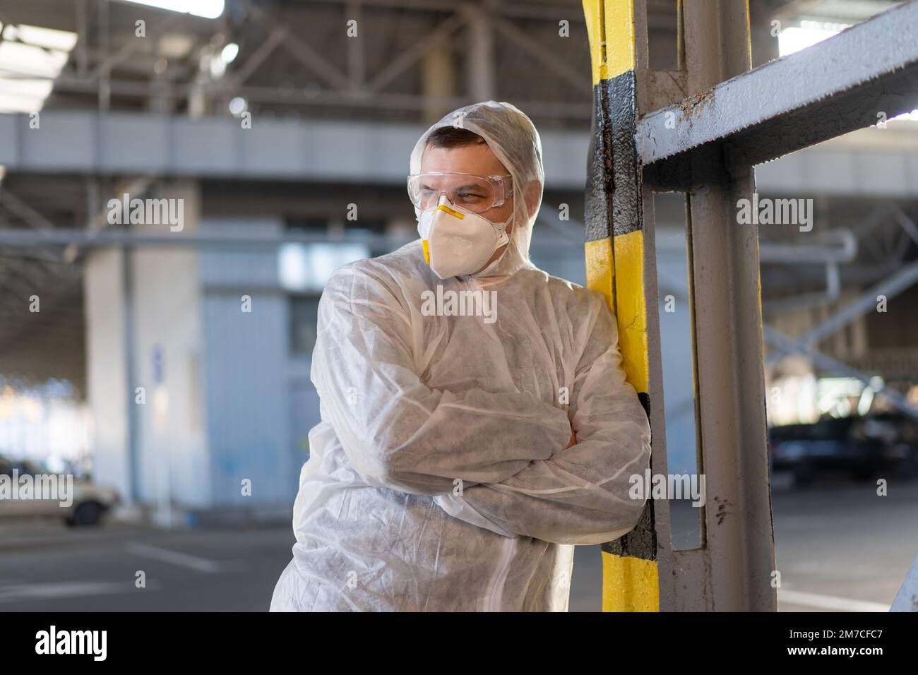COVID-19 coronavirus doctor standing hospital parking dressed white ...