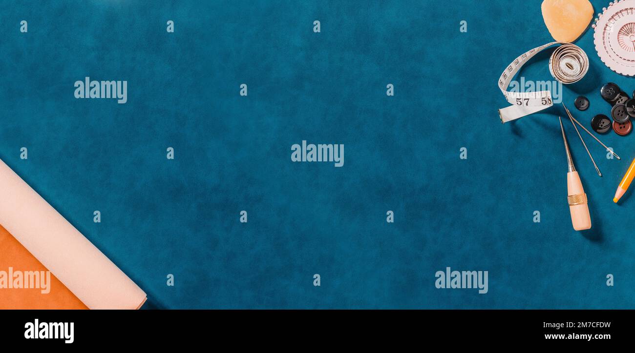 Crafting tools on natural leather on background. Wide frame with sewing ...