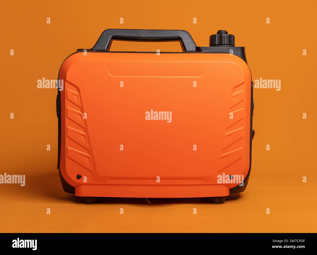 Inverter gasoline generator on an orange background Stock Photo - Alamy