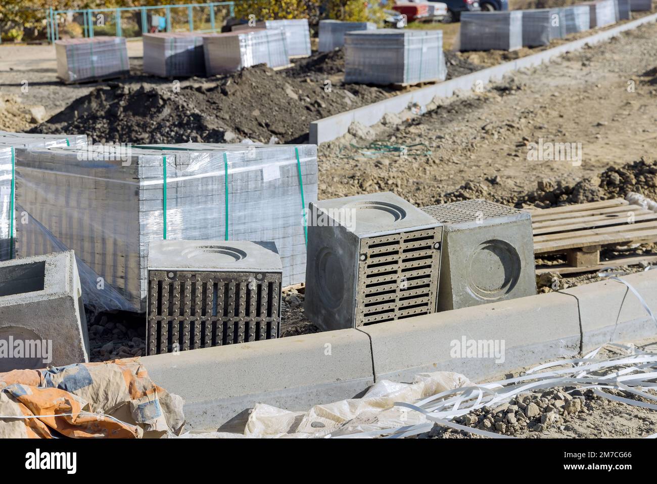 Construction road on well concrete base while stormwater drainage ...