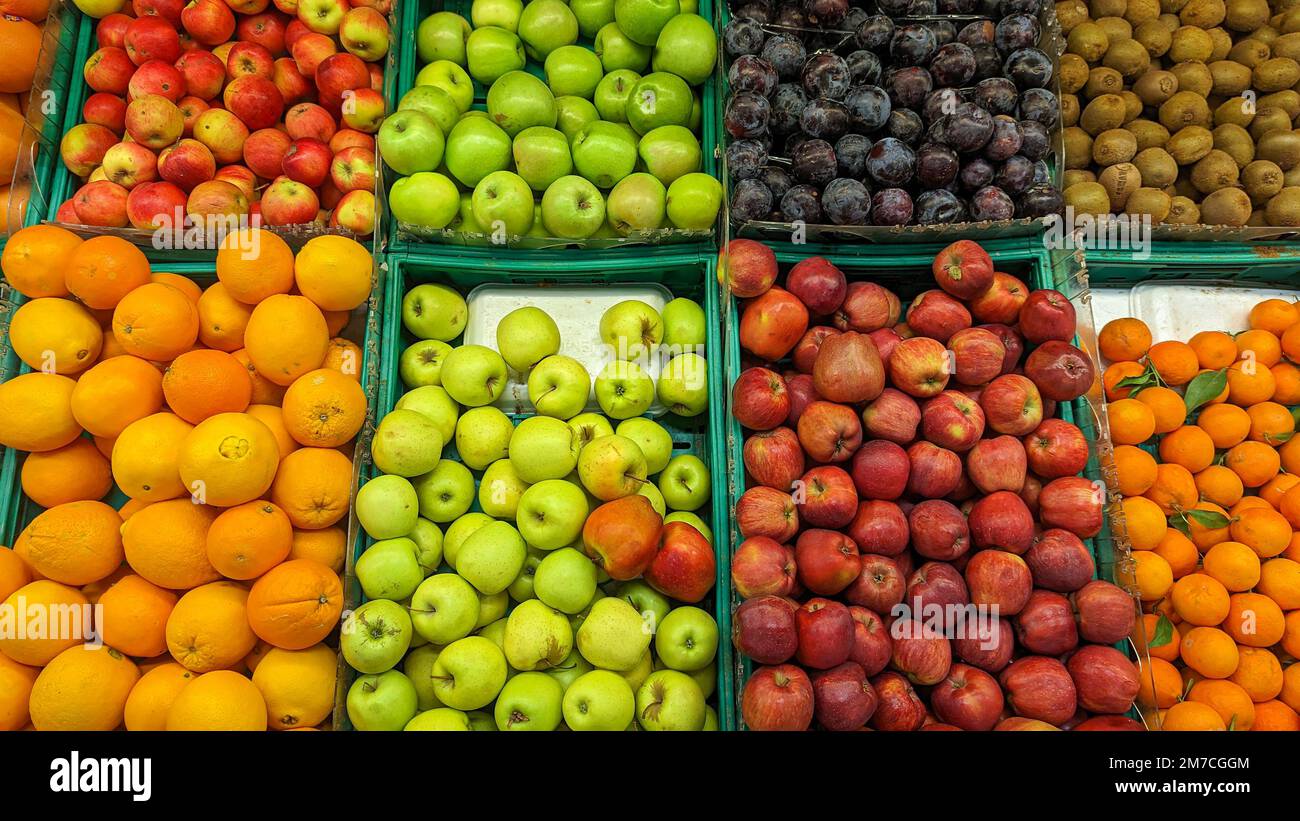 Fresh fruits and vegetables on the supermarket counter. Healthy foods ...