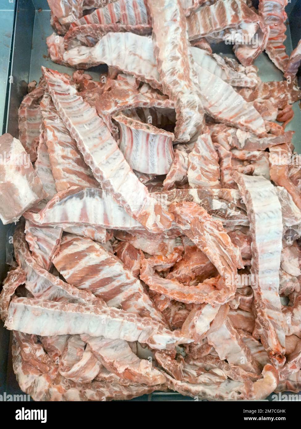 Pork ribs in a shop Stock Photo - Alamy