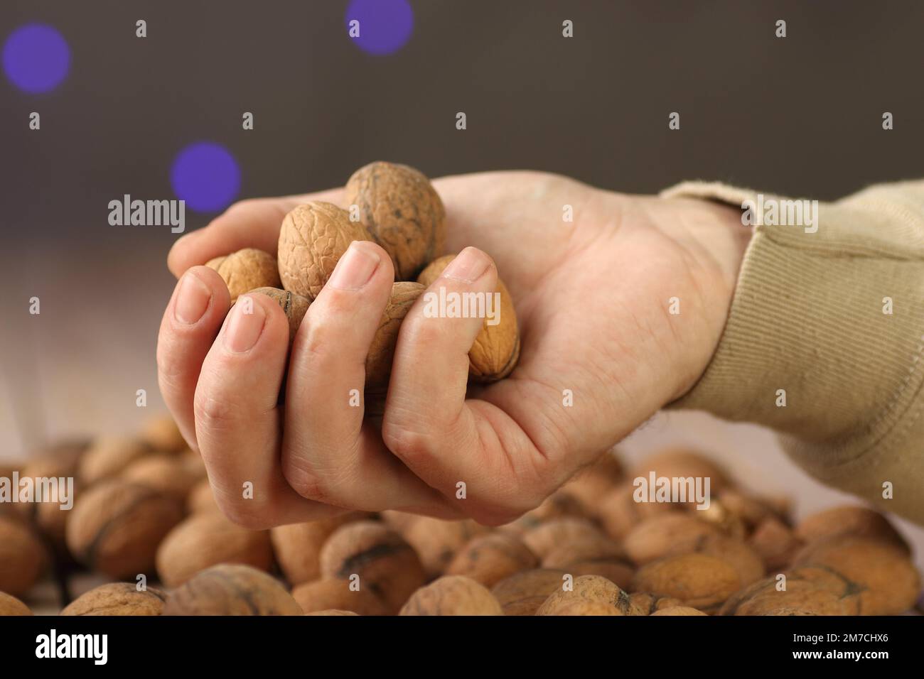 Hand full of nuts hi-res stock photography and images - Alamy