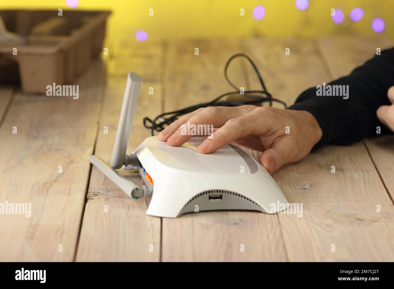 wifi router on the table with colored background Stock Photo - Alamy