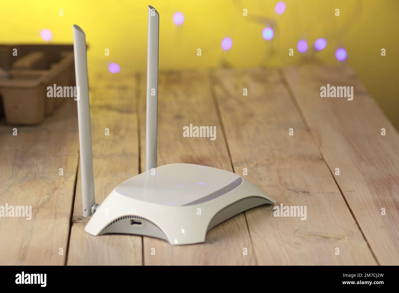 wifi router on the table with colored background Stock Photo - Alamy