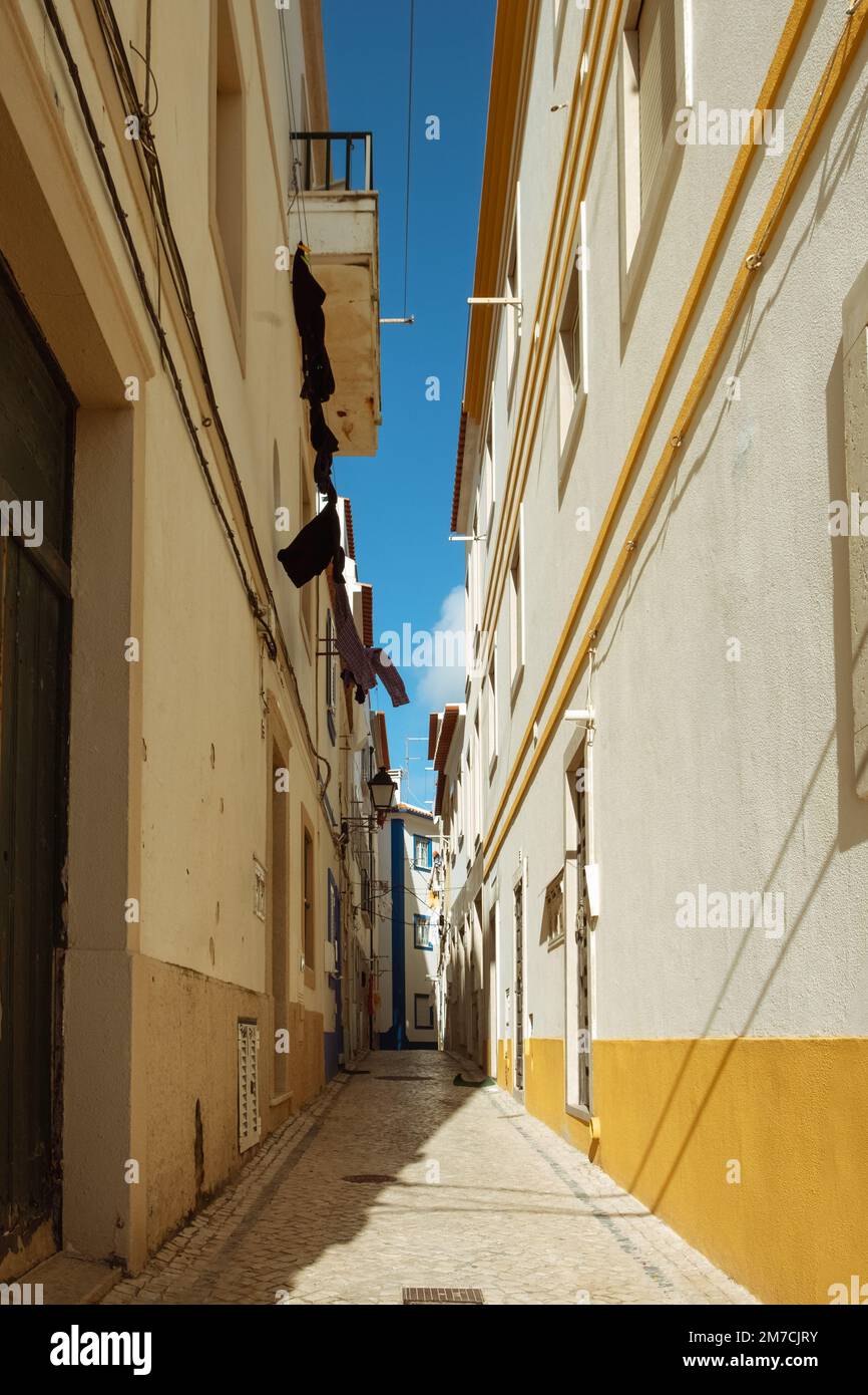 View of a narrow street in Nazare, Portugal Stock Photo - Alamy