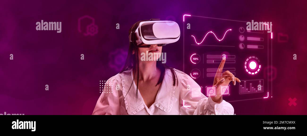 Woman, employee wearing VR glasses and working on virtual holographic ...
