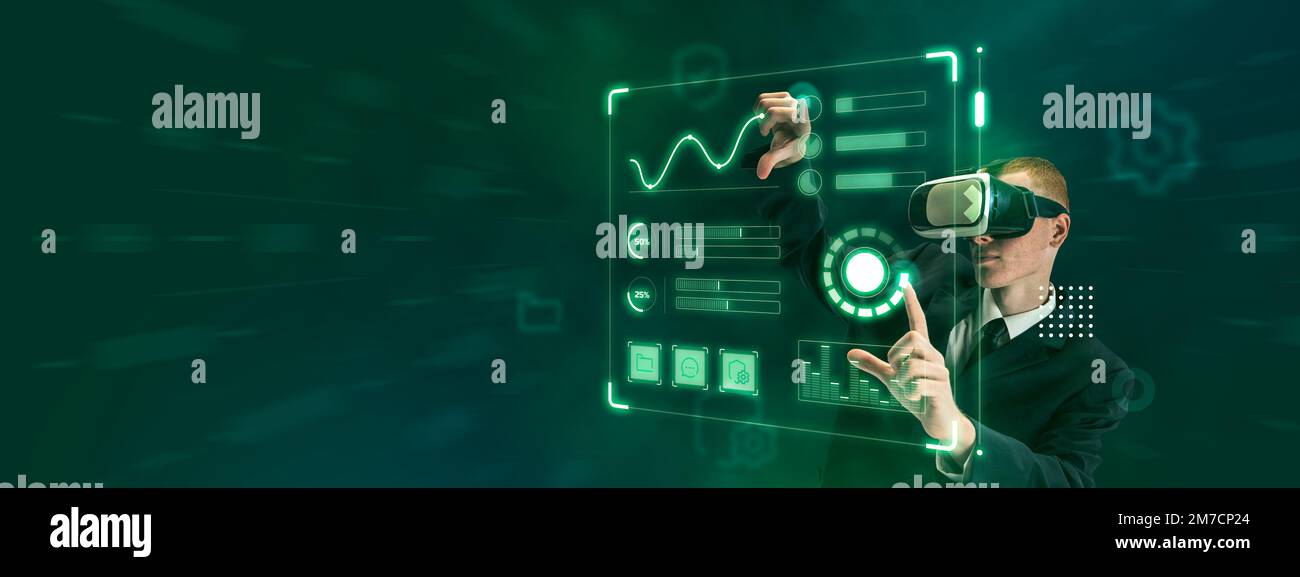 Man, employee wearing VR glasses and working on virtual holographic ...