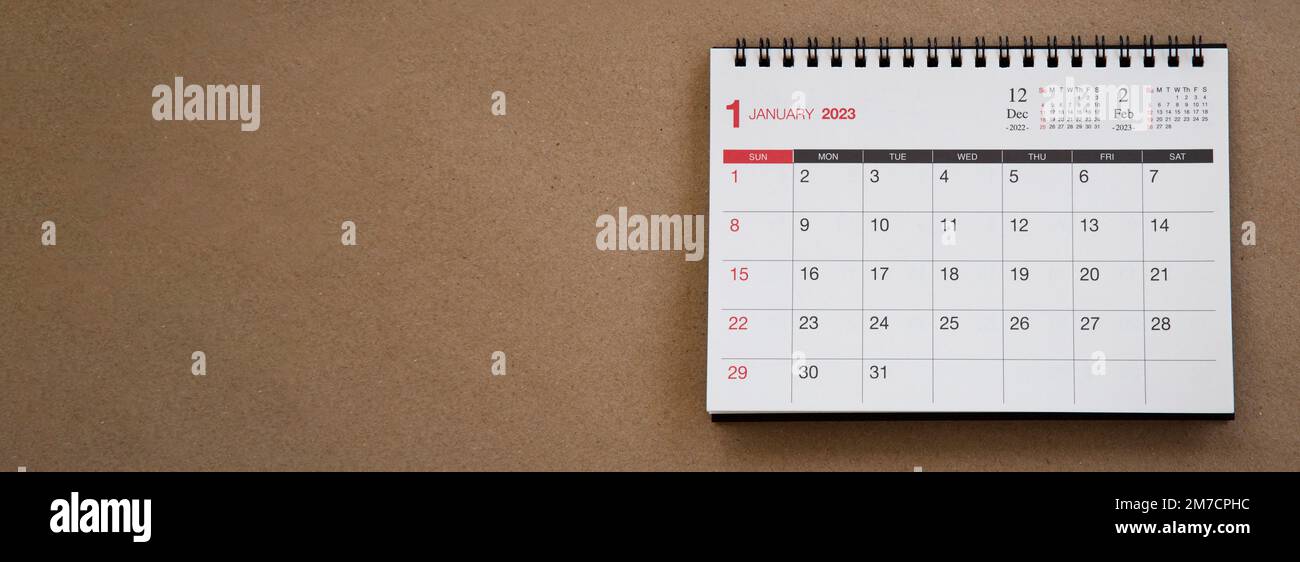 white calendar on brown background Stock Photo - Alamy