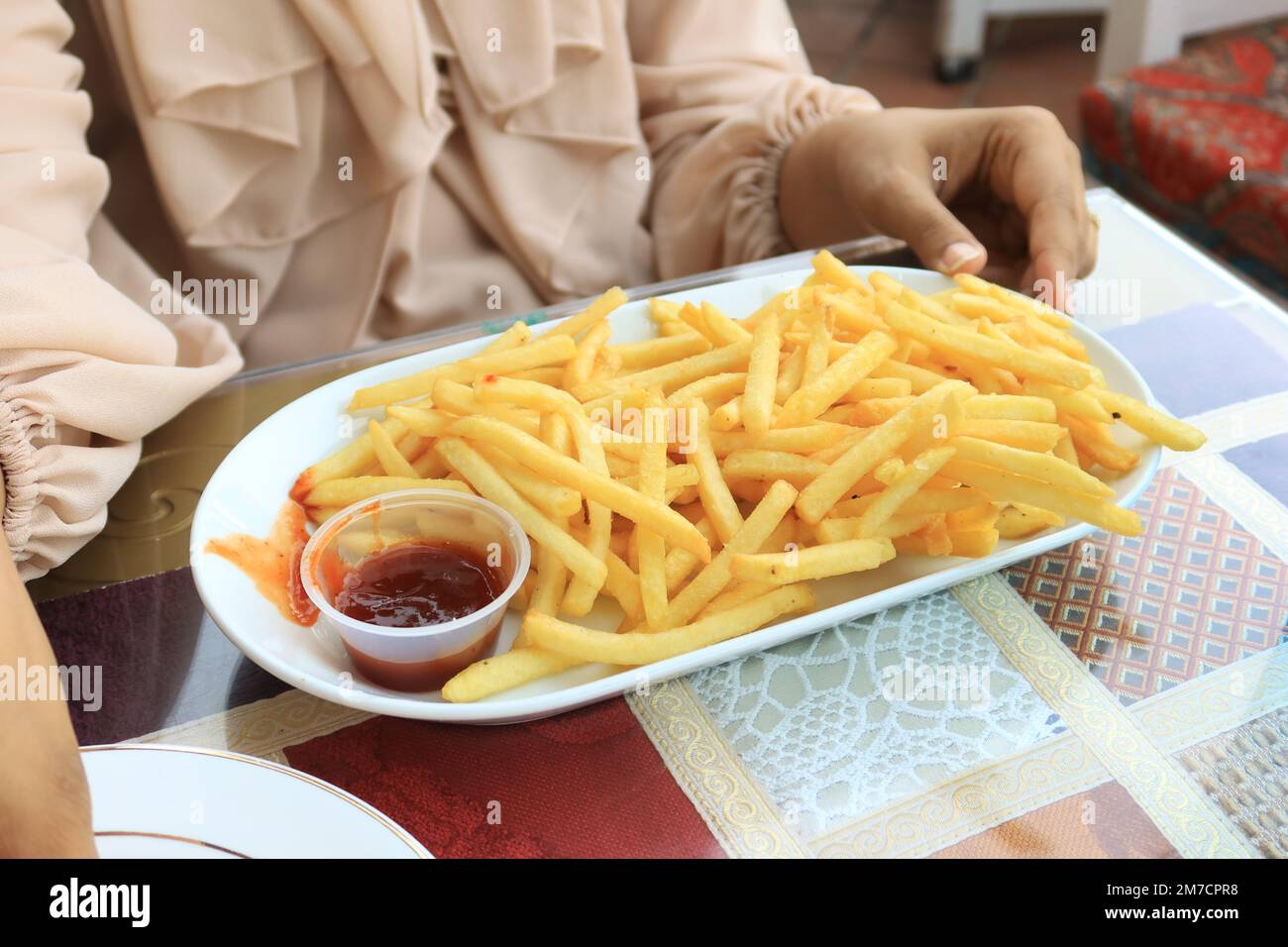 detail shot of French Fries on table Stock Photo - Alamy