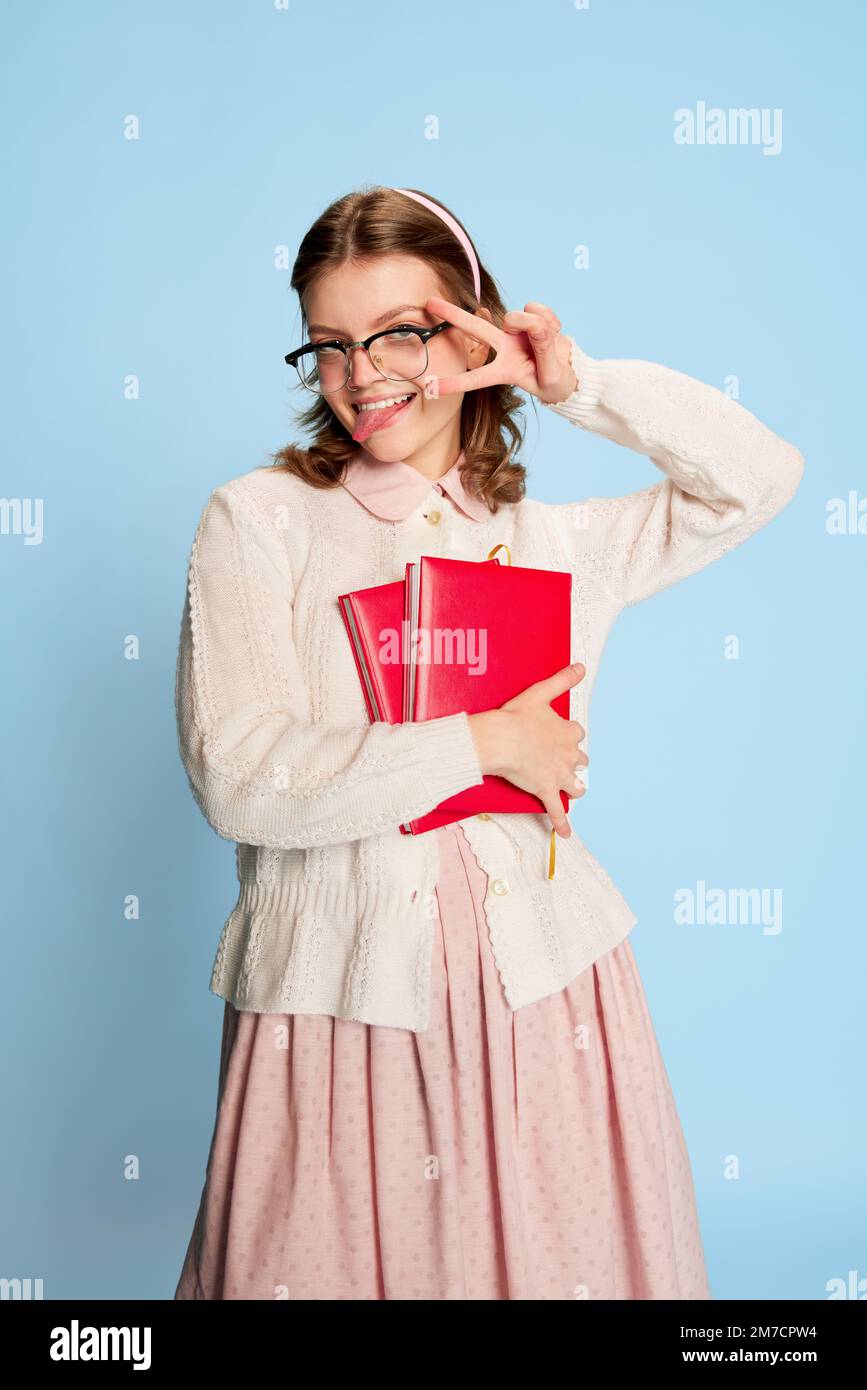 Portrait of funny beautiful girl in vintage style outfit posing over ...