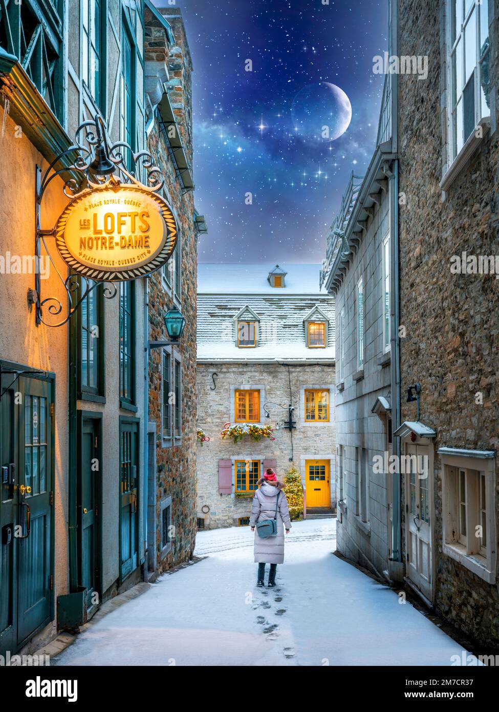 Woman walking in the old Streets of Petit Champlain, Old Quebec City ...