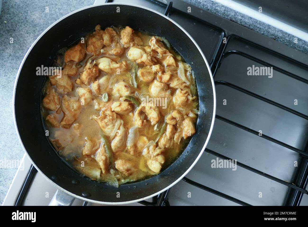 Cooking chicken curry hi-res stock photography and images - Alamy