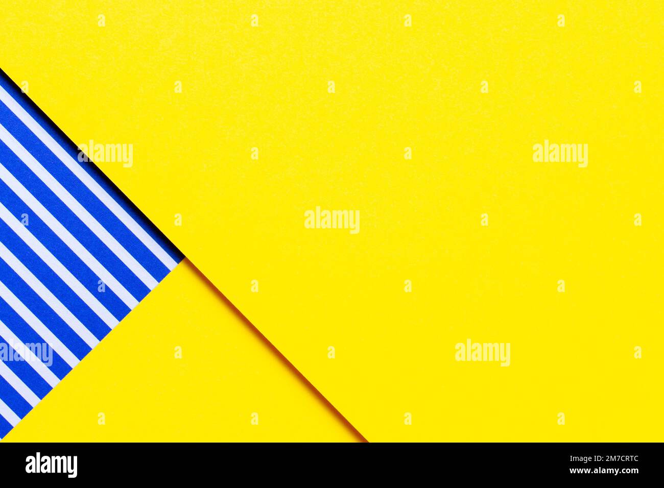 Abstract geometric bright colored papers texture background. Yellow ...