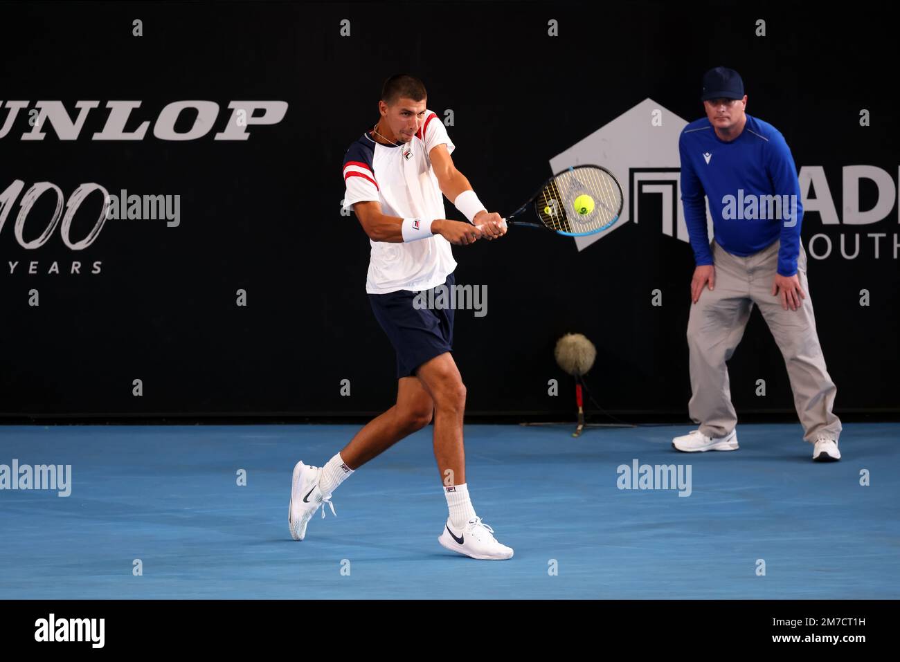 Adelaide, Australia, 9 January, 2023. Alexei Popyrin of Australia plays a backhand during the ...