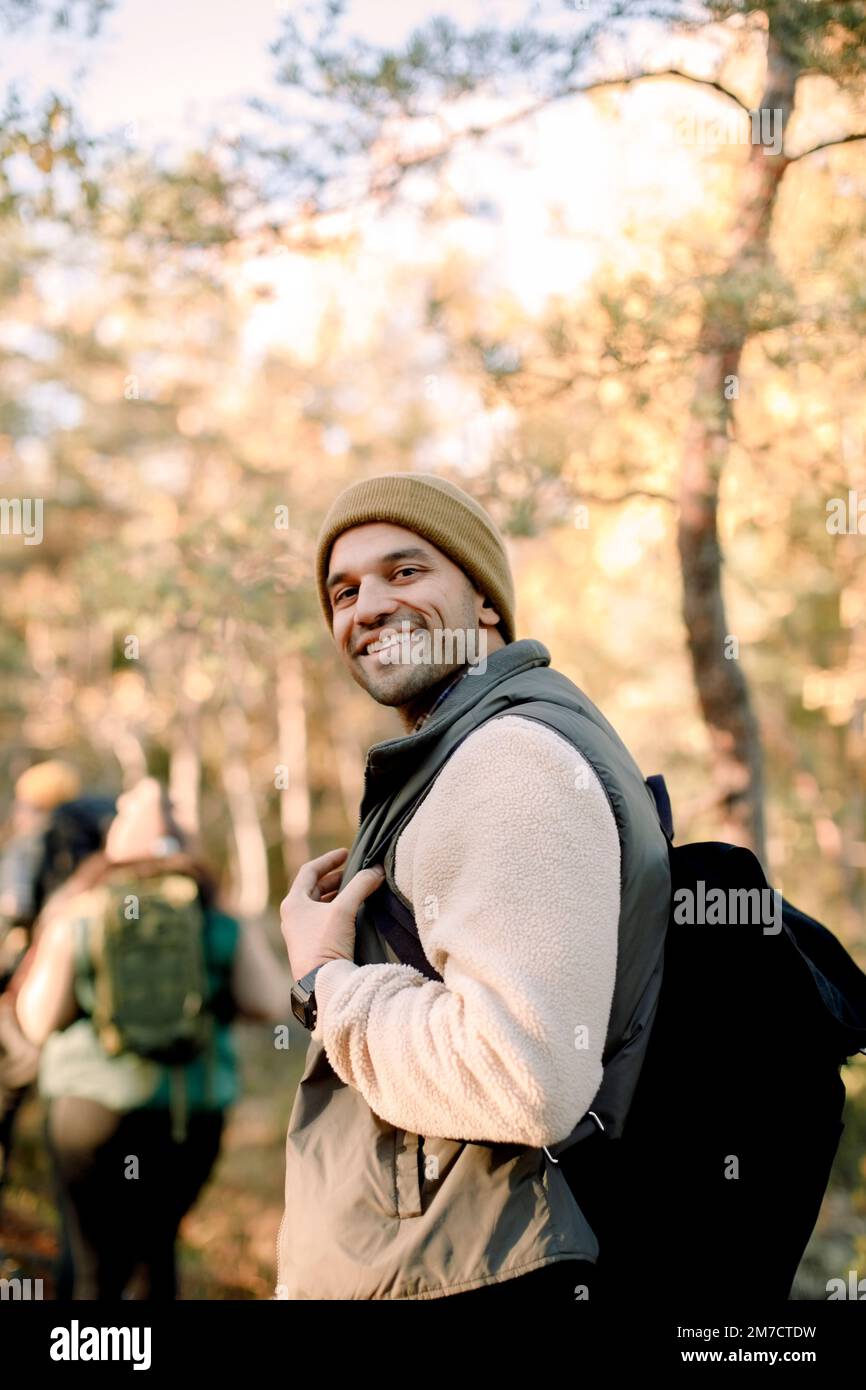 Man backpack hiking in forest hi-res stock photography and images - Alamy