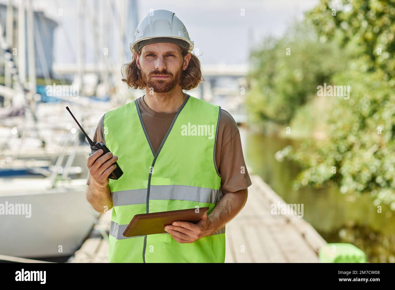 Male construction supervisor in reflective hi-res stock photography and ...