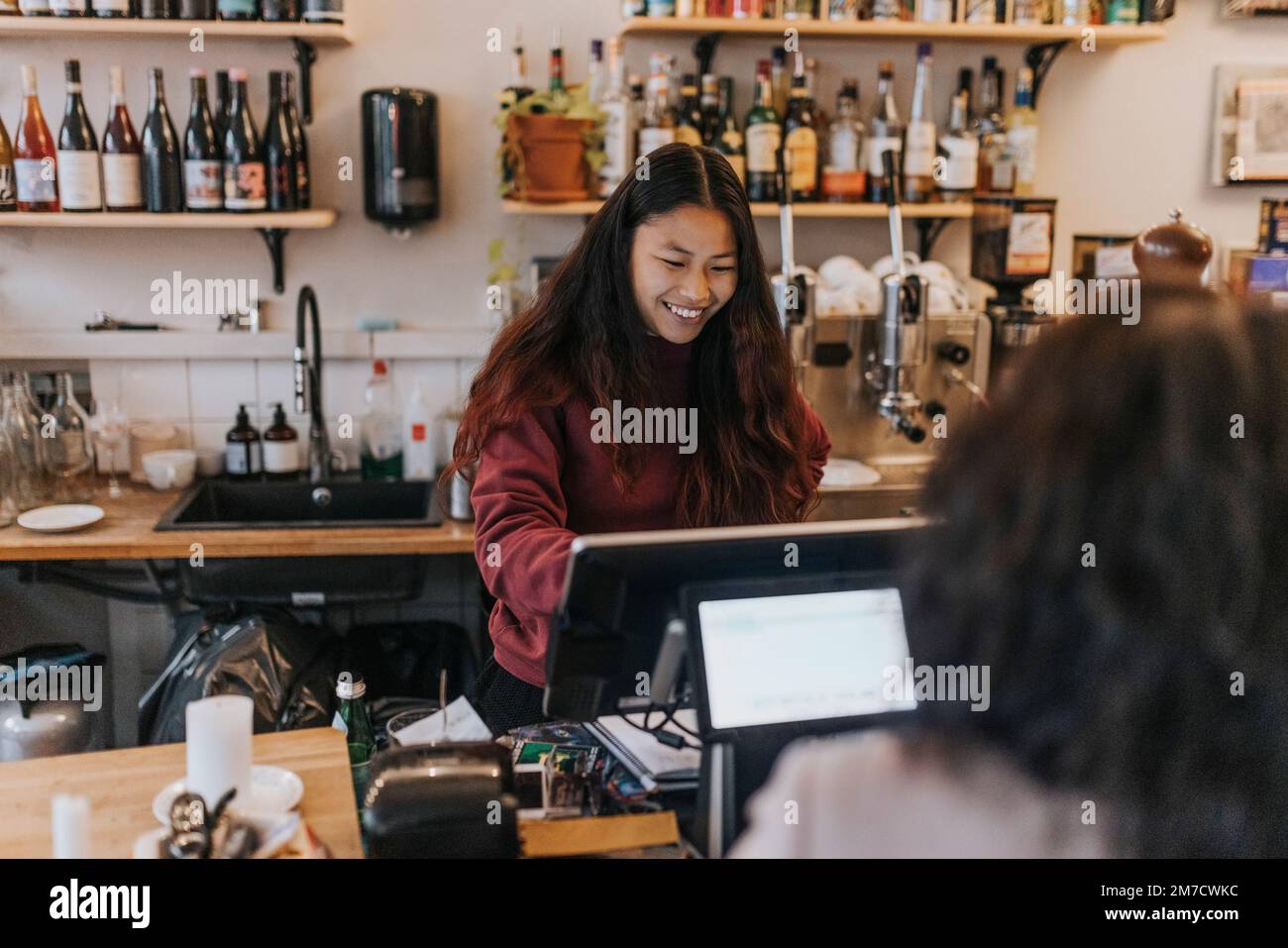 Female customer ordering from coffee hi-res stock photography and ...