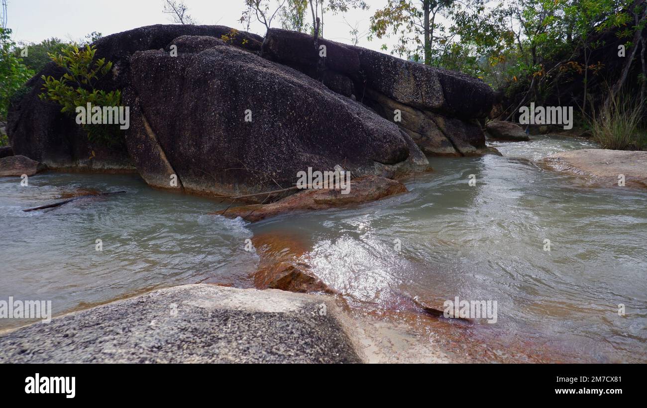 Fresh River Flows Across Huge Rock Formations Stock Photo - Alamy