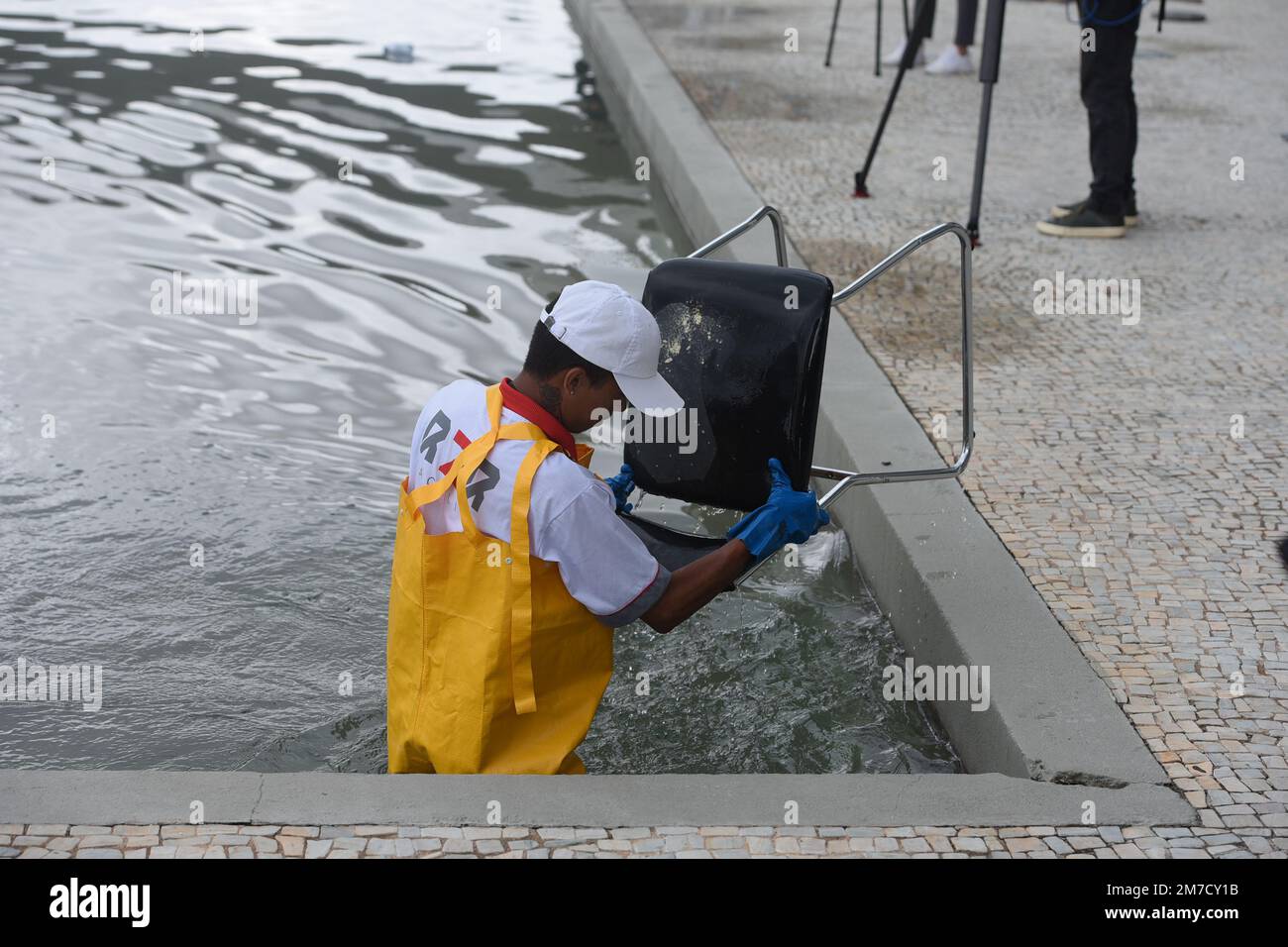 Clean-up crews pick up the pieces and clear the debrias on Monday Jan ...