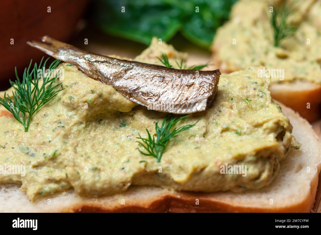 Sandwich with pate and sprats. Sprat pate with spinach and pepper ...