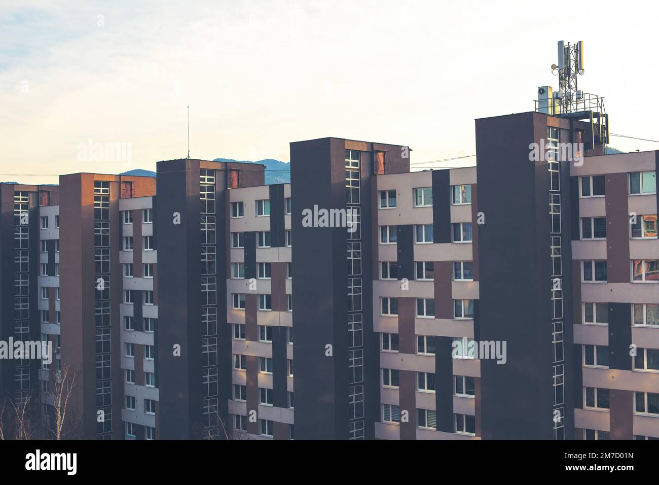 Colorful panel building photographed during sunset Stock Photo - Alamy