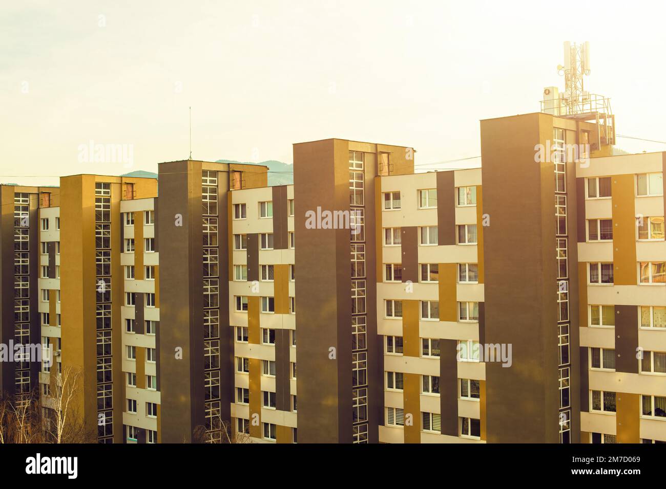 Colorful panel building photographed during sunset Stock Photo - Alamy