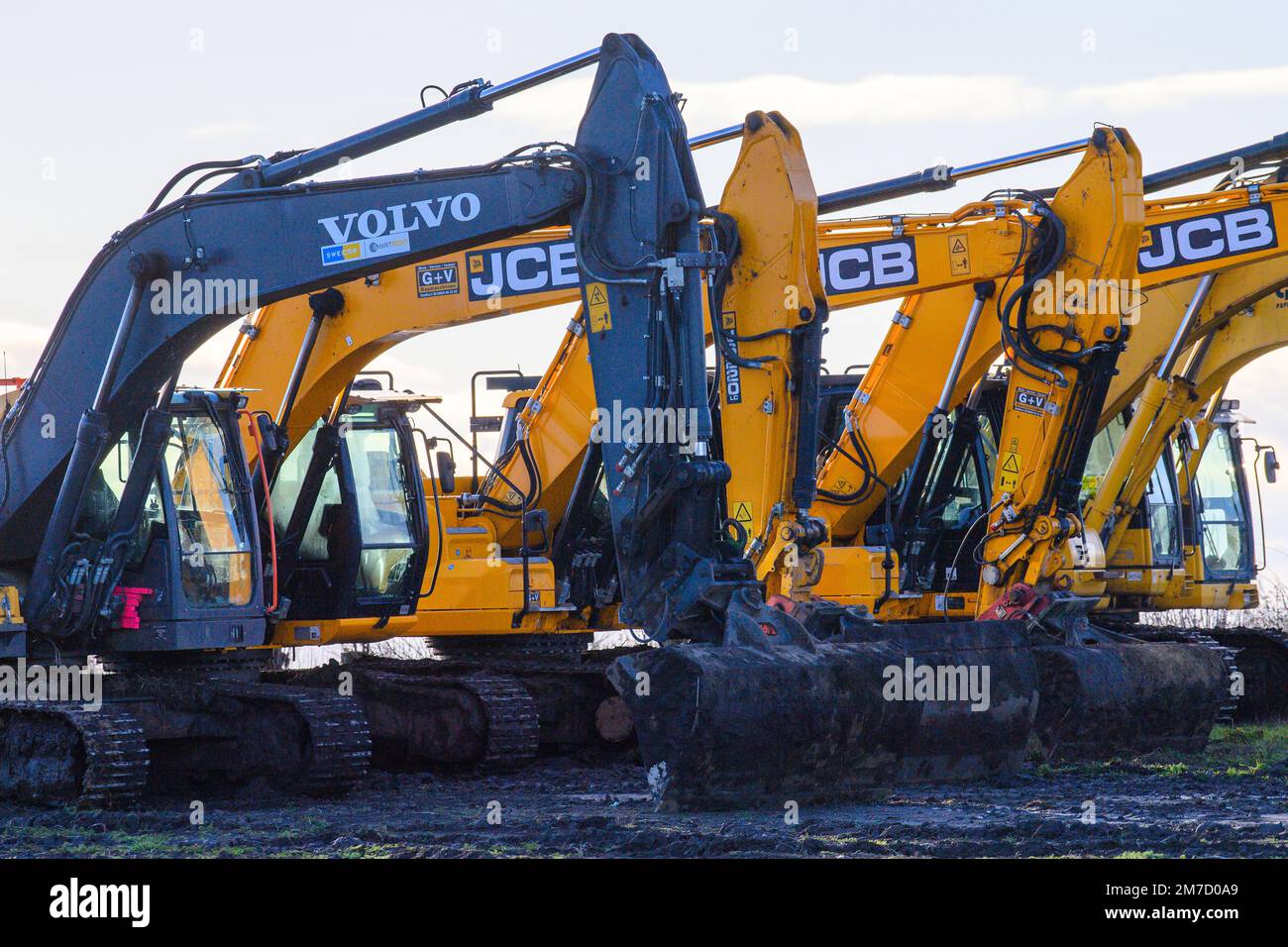 Magdeburg, Germany. 09th Jan, 2023. Excavators stand side by side at ...