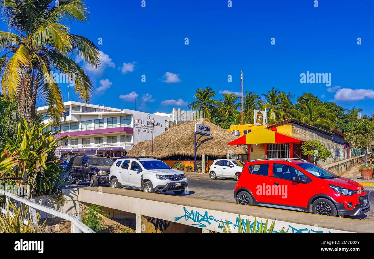Colorful streets cars high traffic stores people buildings and trade in ...