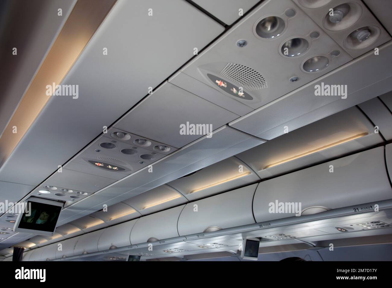 Airplane cabin luggage rack hi-res stock photography and images - Alamy