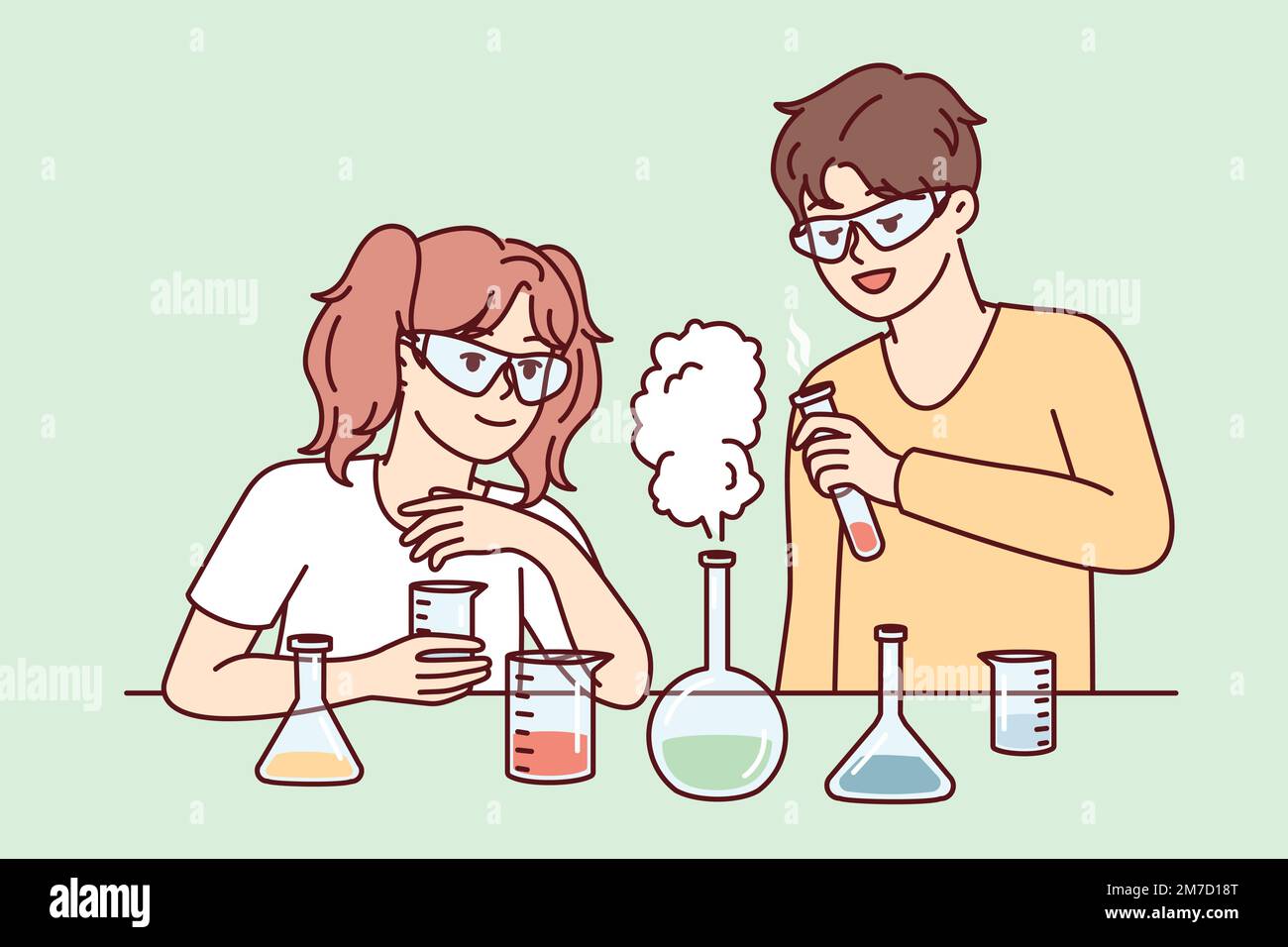 Youth boy and girl conduct chemical experiments standing near table ...