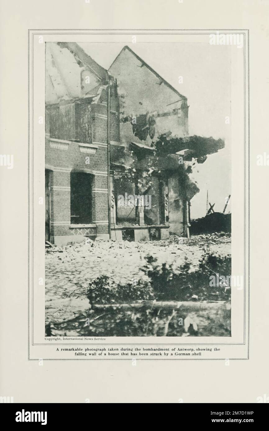 Wall Falling under Shell Fire at Antwerp from the book The story of the ...