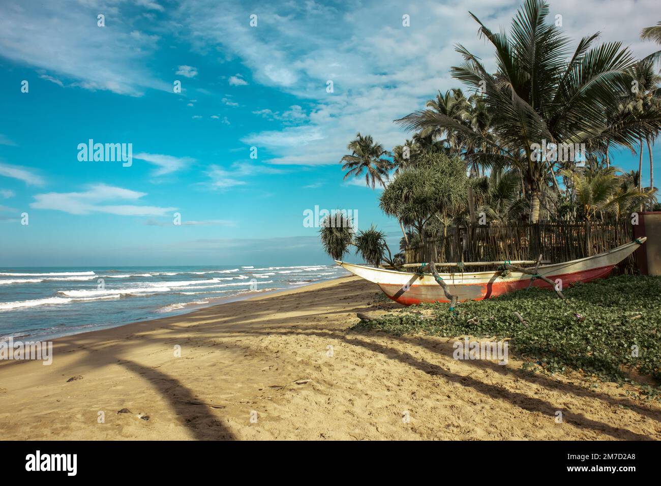 Boat on beautiful beach Stock Photo - Alamy