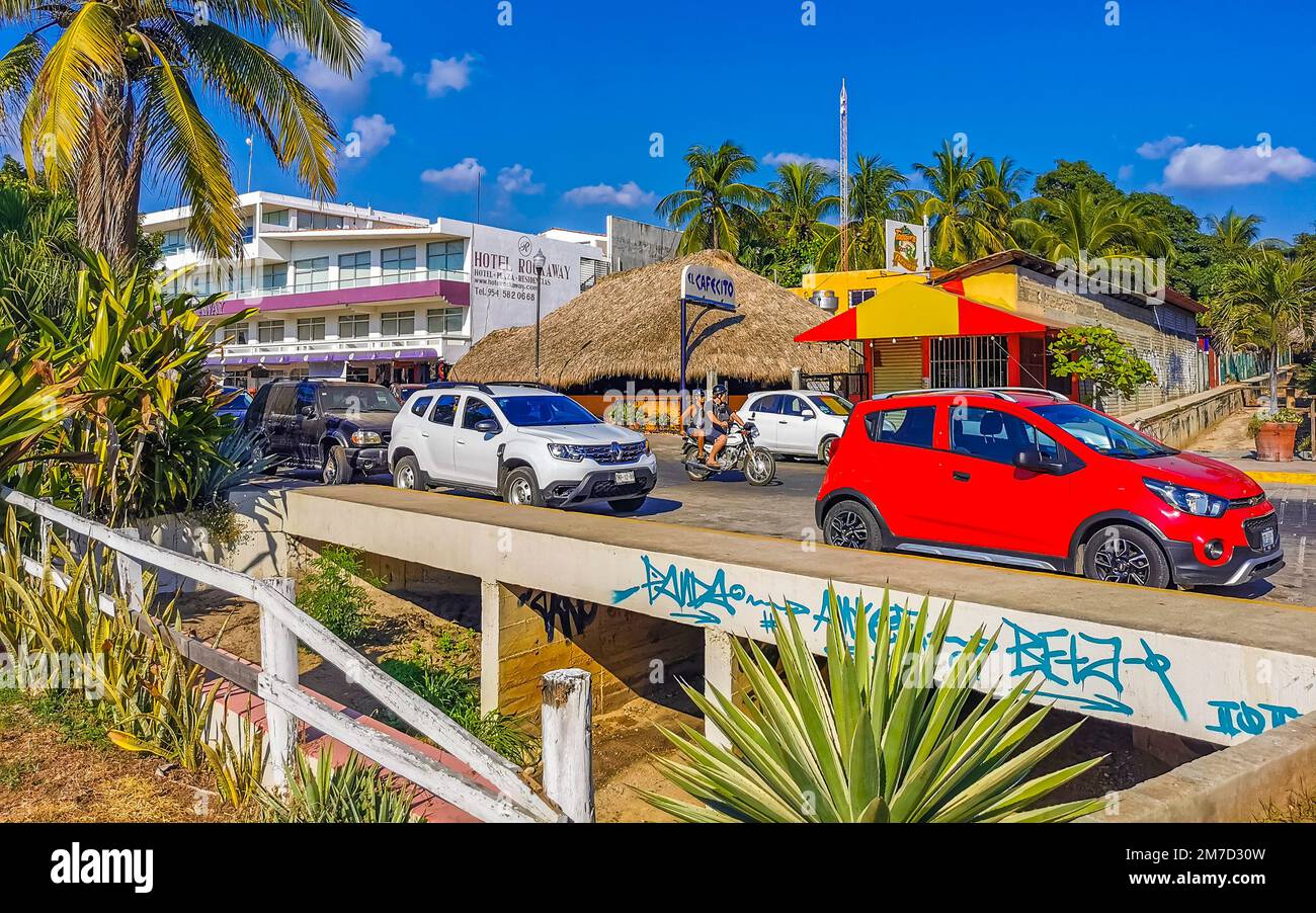 Colorful streets cars high traffic stores people buildings and trade in ...