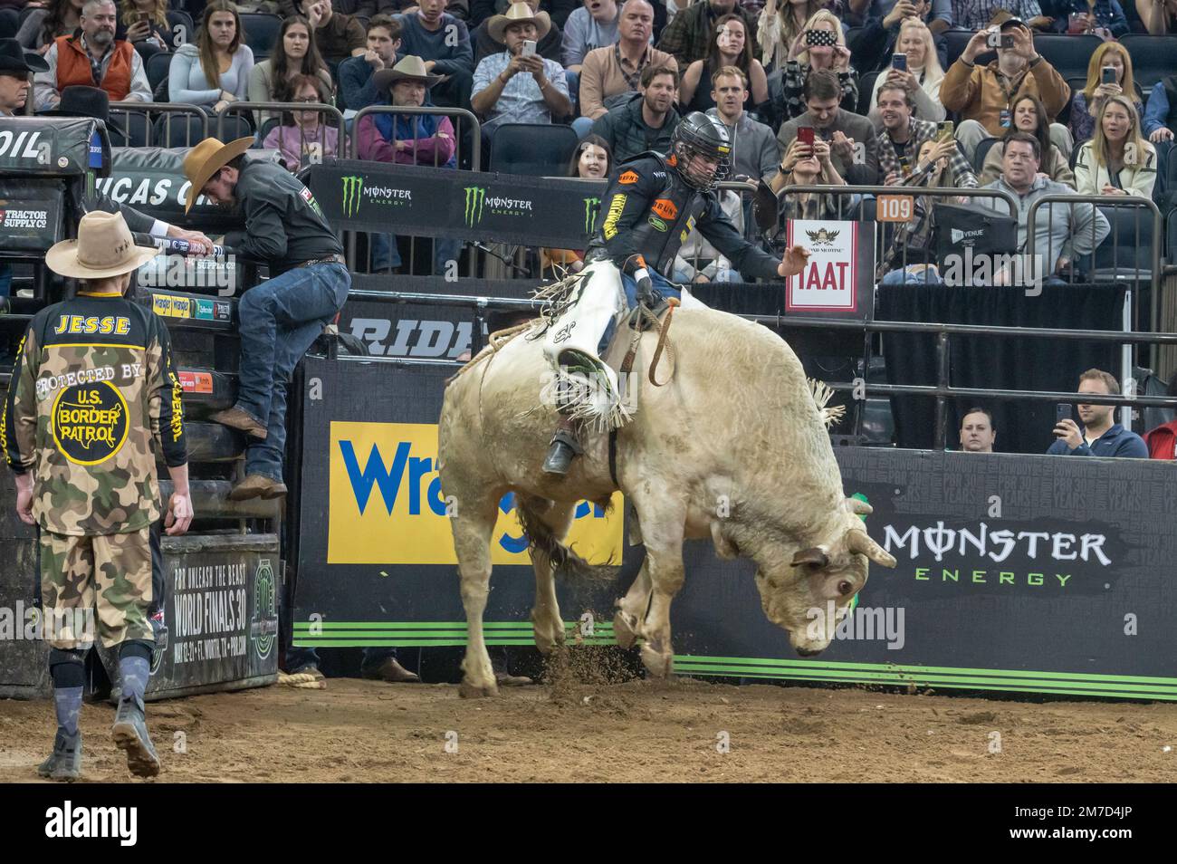 Eli Vastbinder rides Smooth Kat during the Professional Bull Riders ...