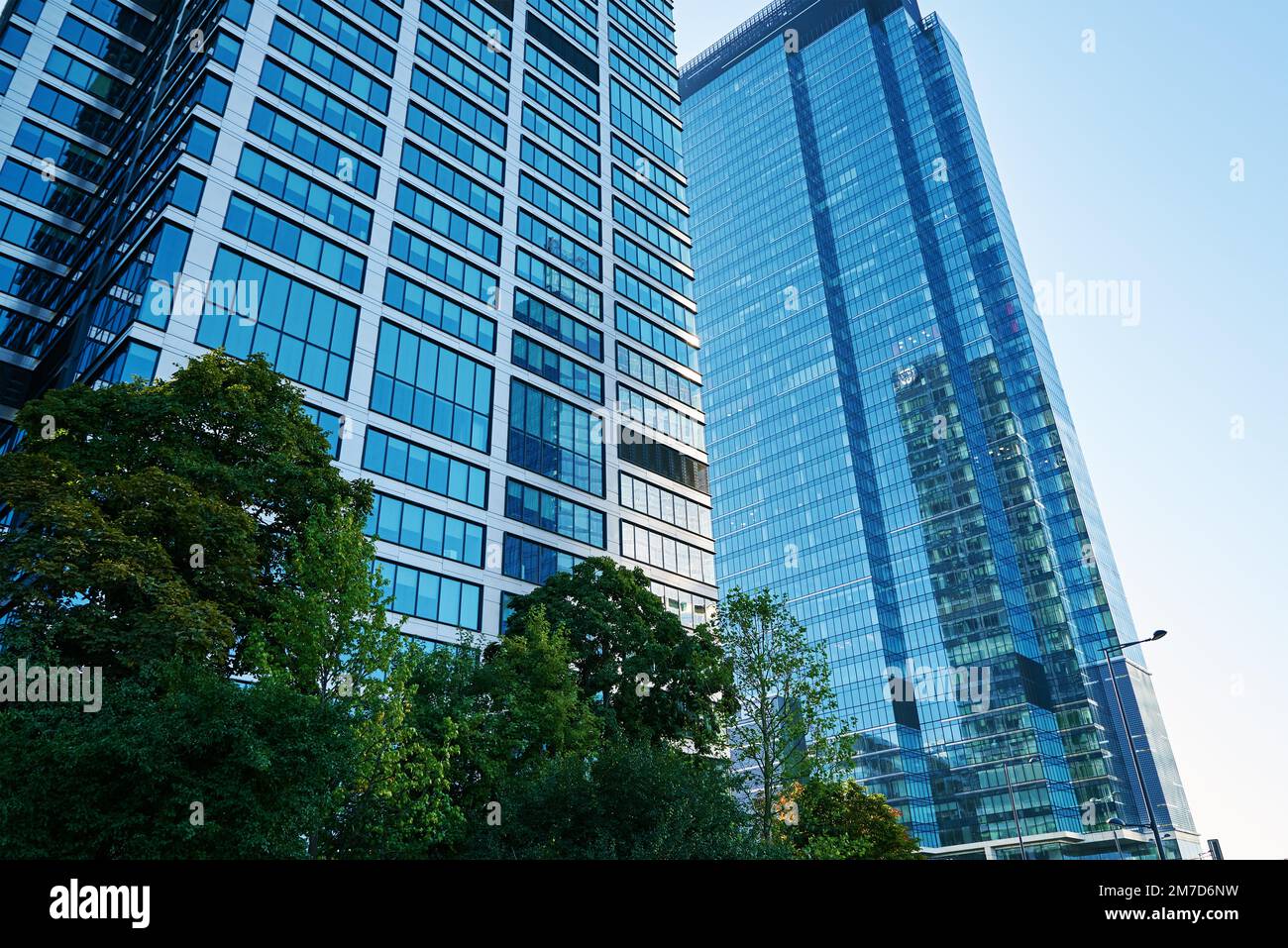 Detail of glass office building facade with reflections. Modern city ...