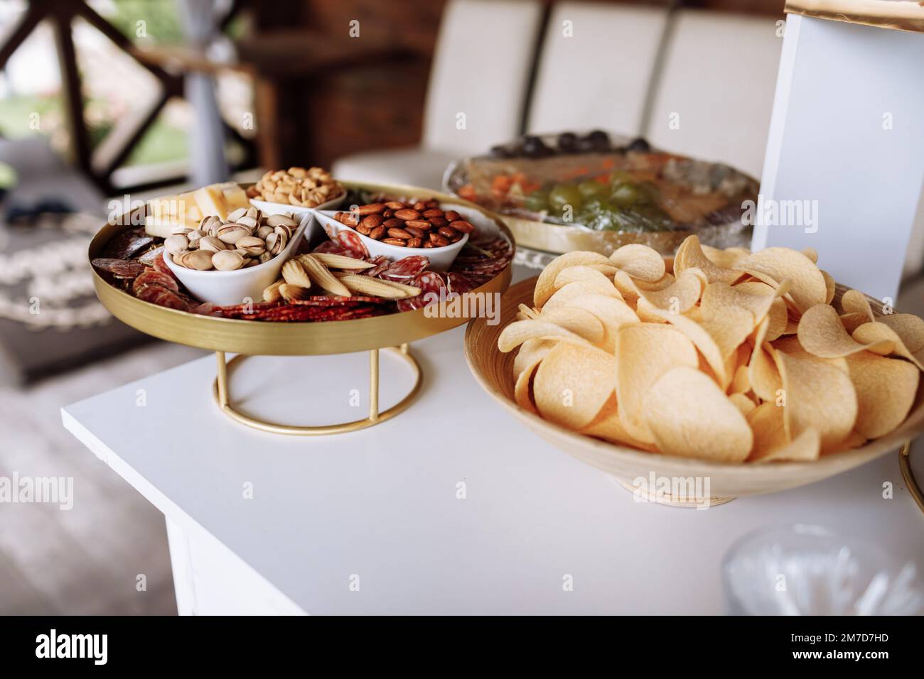 Appetizers table with different antipasti, charcuterie, snacks ...