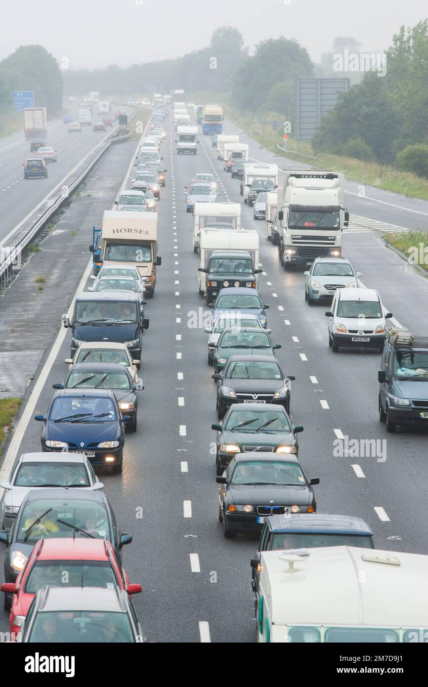 Queues of cars and other vehicles on the M5 near Cheltenham travelling ...