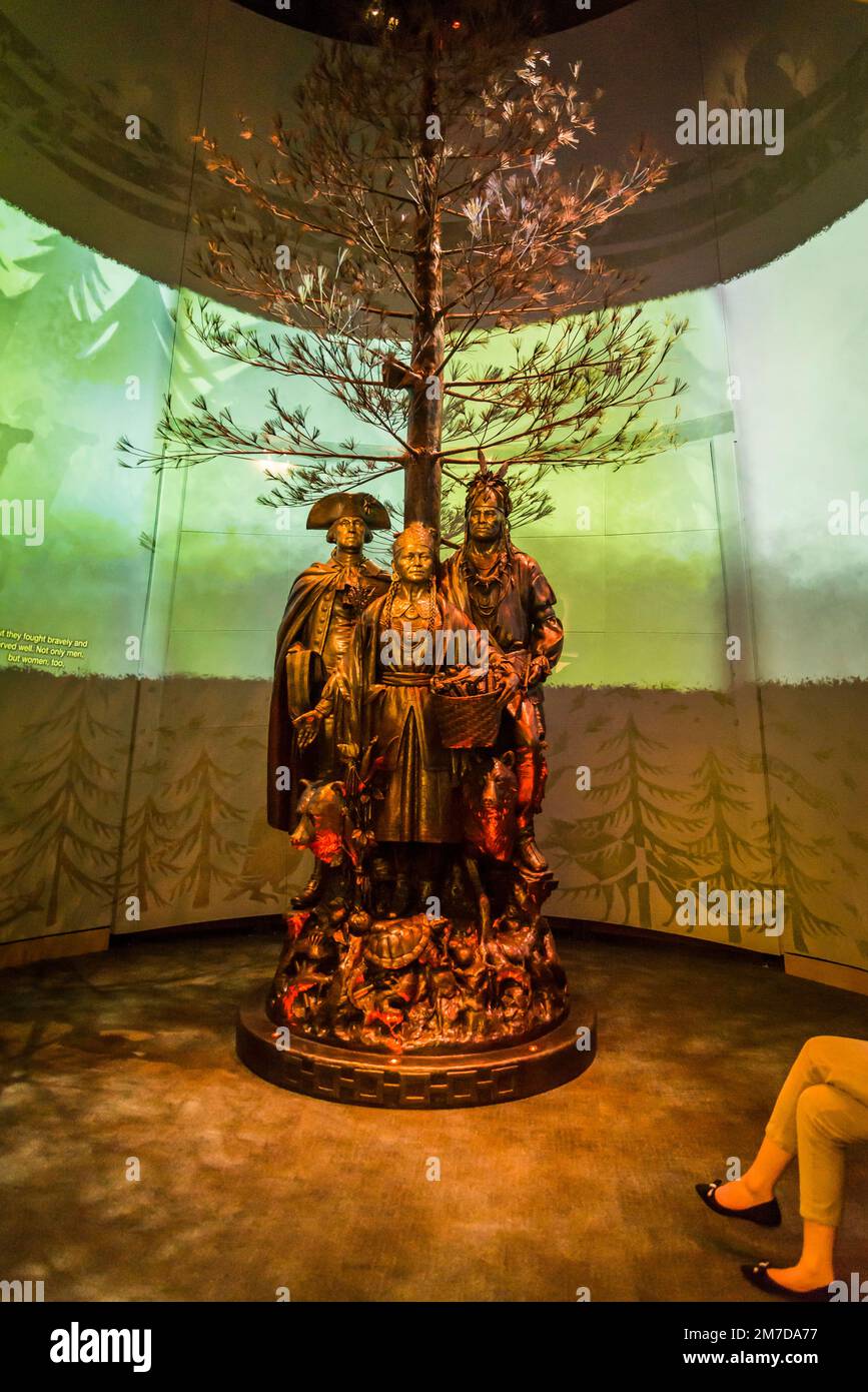 Sculpture with a tree, Exhibits representing Native American culture ...