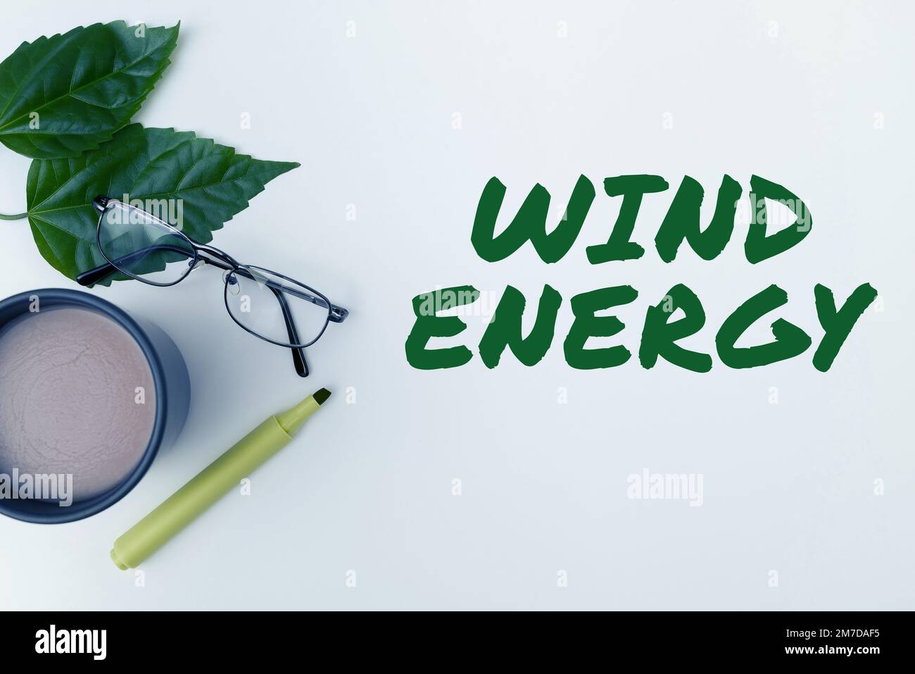 Handwriting text Wind Energy. Business approach the process by which ...