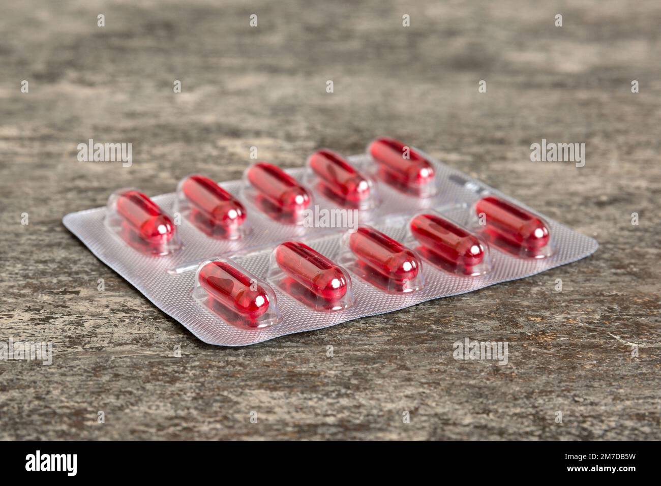 Blister package with Vitamin a on color background. Medicine pills on a ...