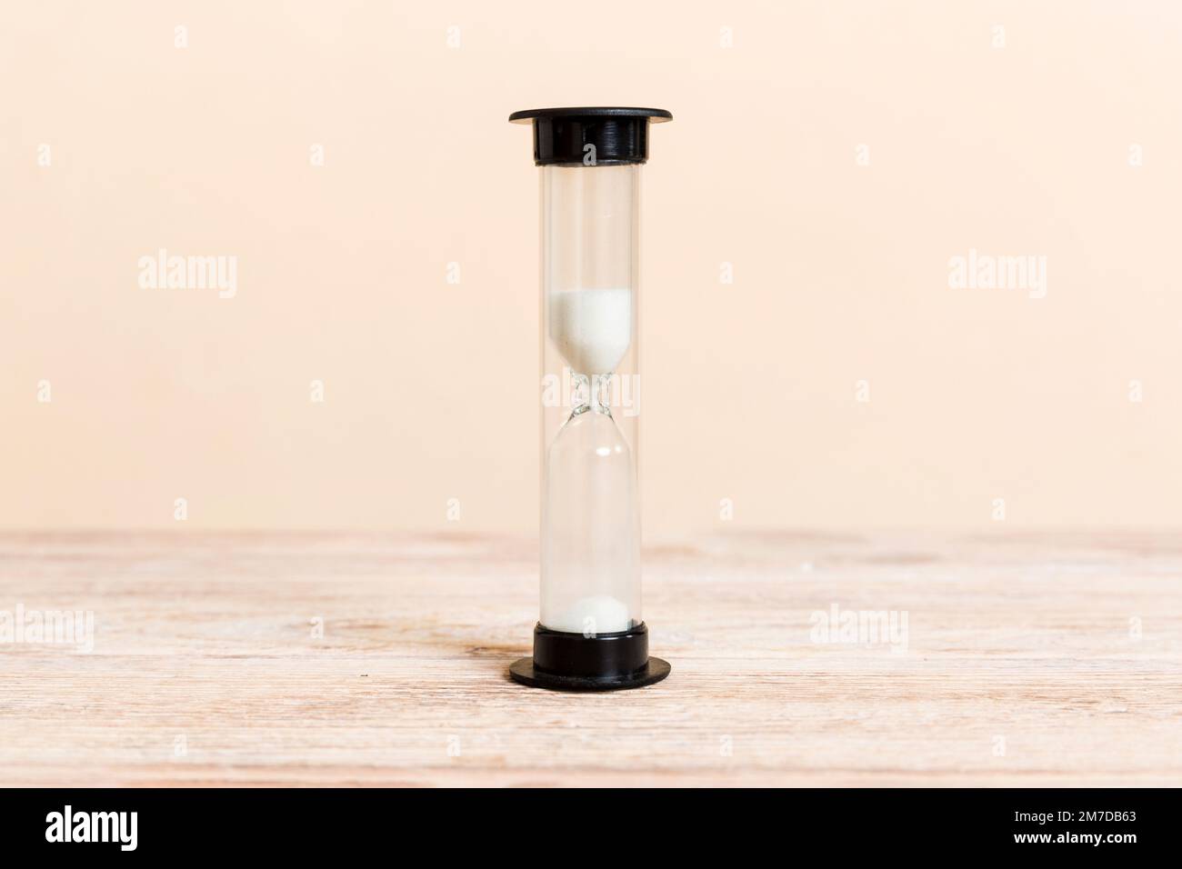 hourglass on the table, sand clock as time passing concept for business ...