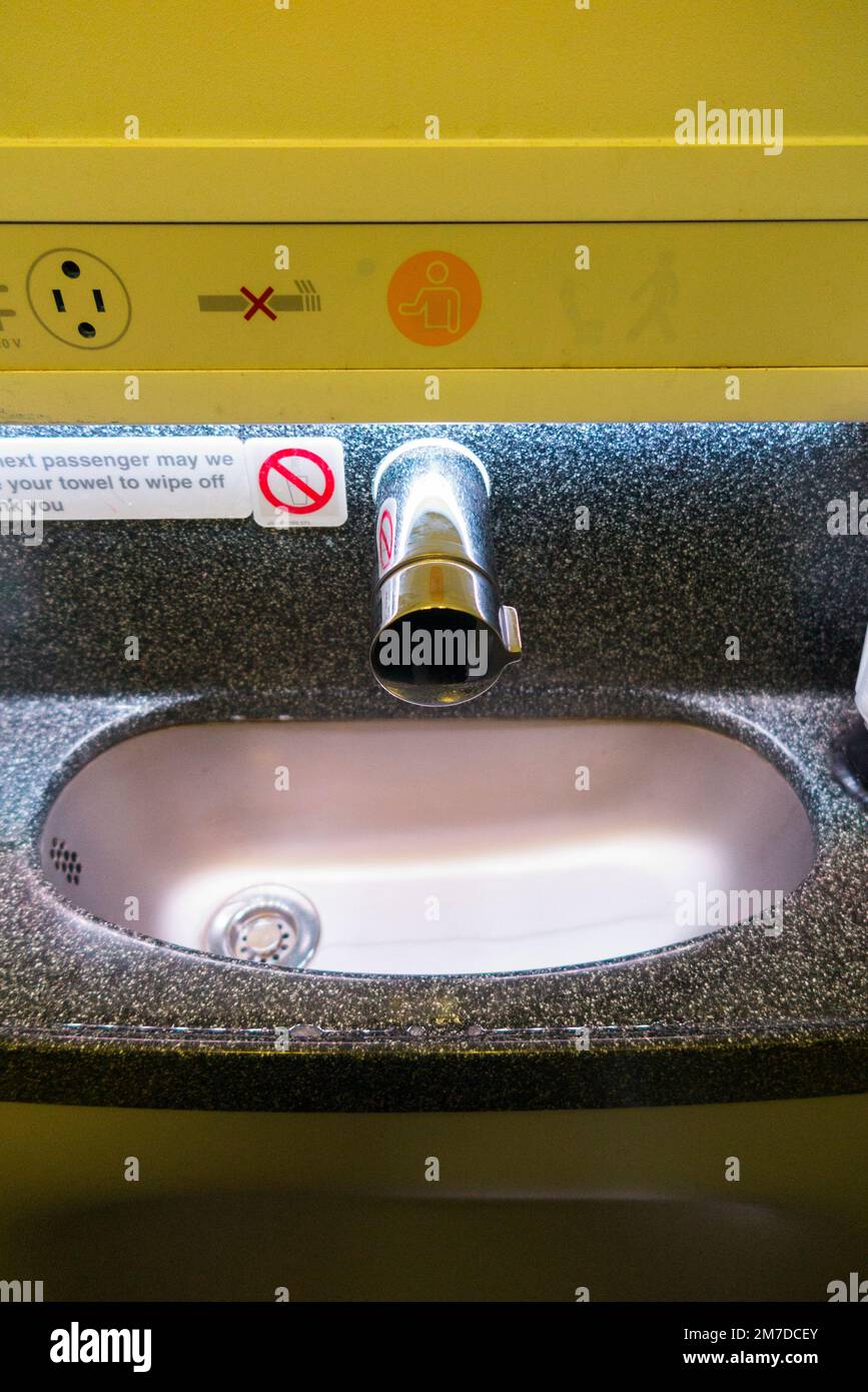 Washbasin for hand washing / sink mixer tap, in toilet cubicle / loo ...