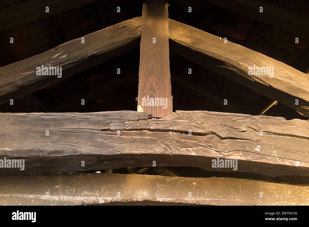 Details, including wooden beams holding up the roof, inside a four ...
